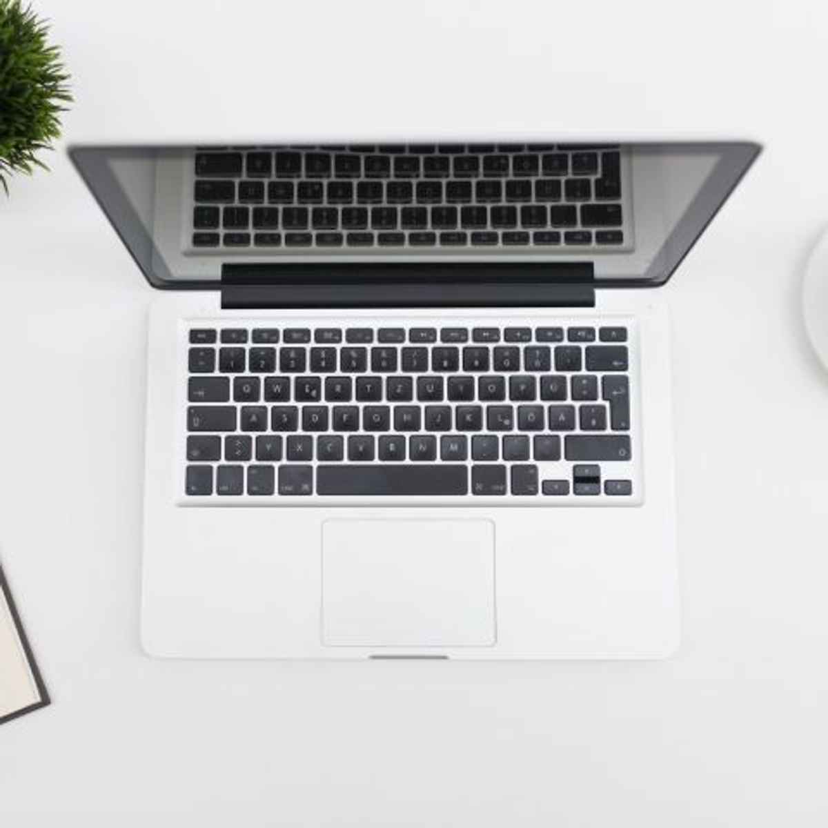 Apple MacBook keyboards to use new scissor switch design, including ...